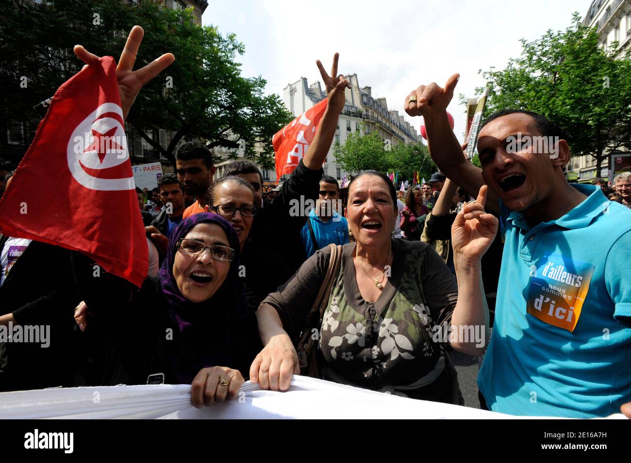 Tunisian migrants participate at the the annual May Day workers' events ...