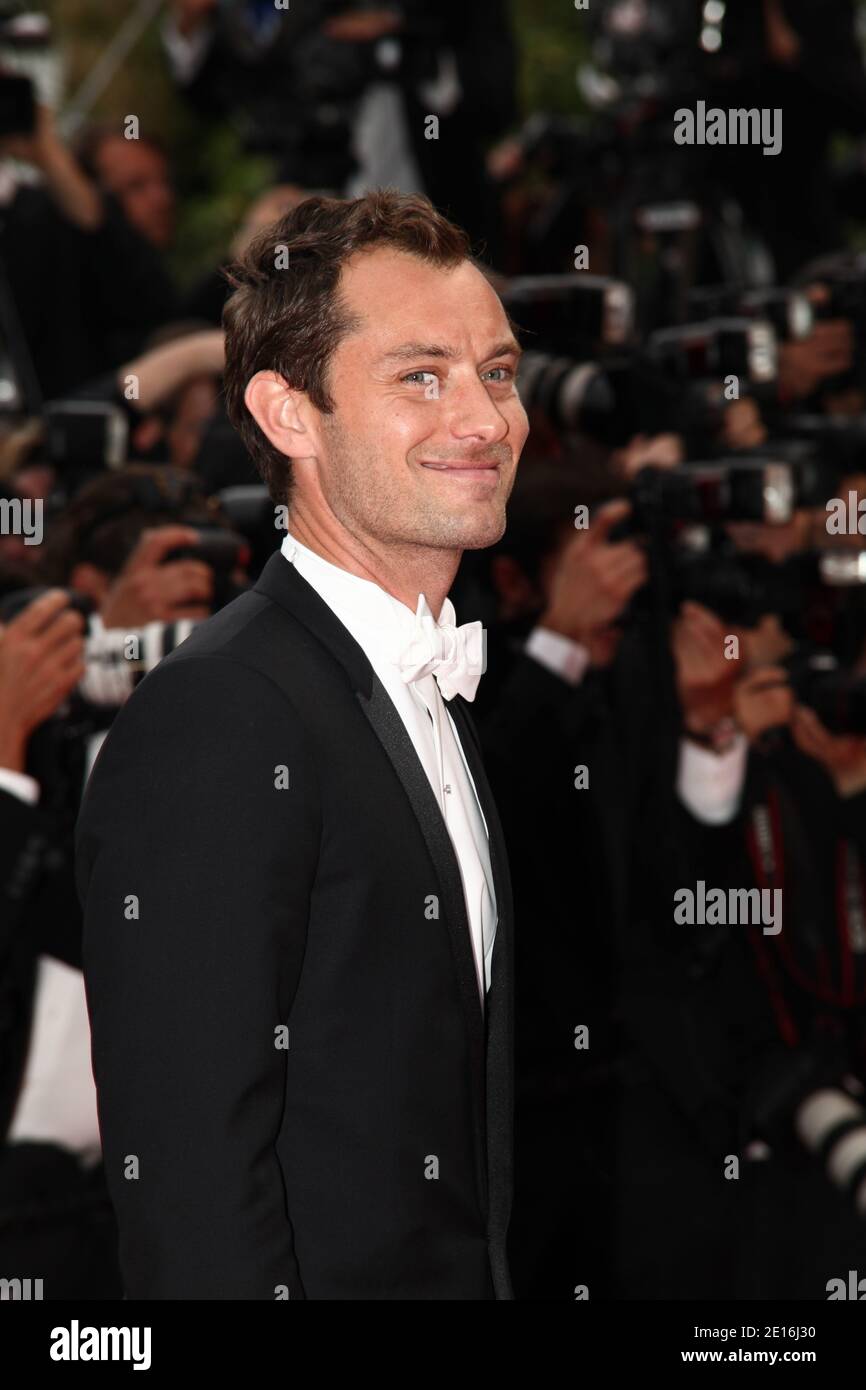 Actor Jude Law arriving for the Opening Ceremony of the 64th Cannes ...