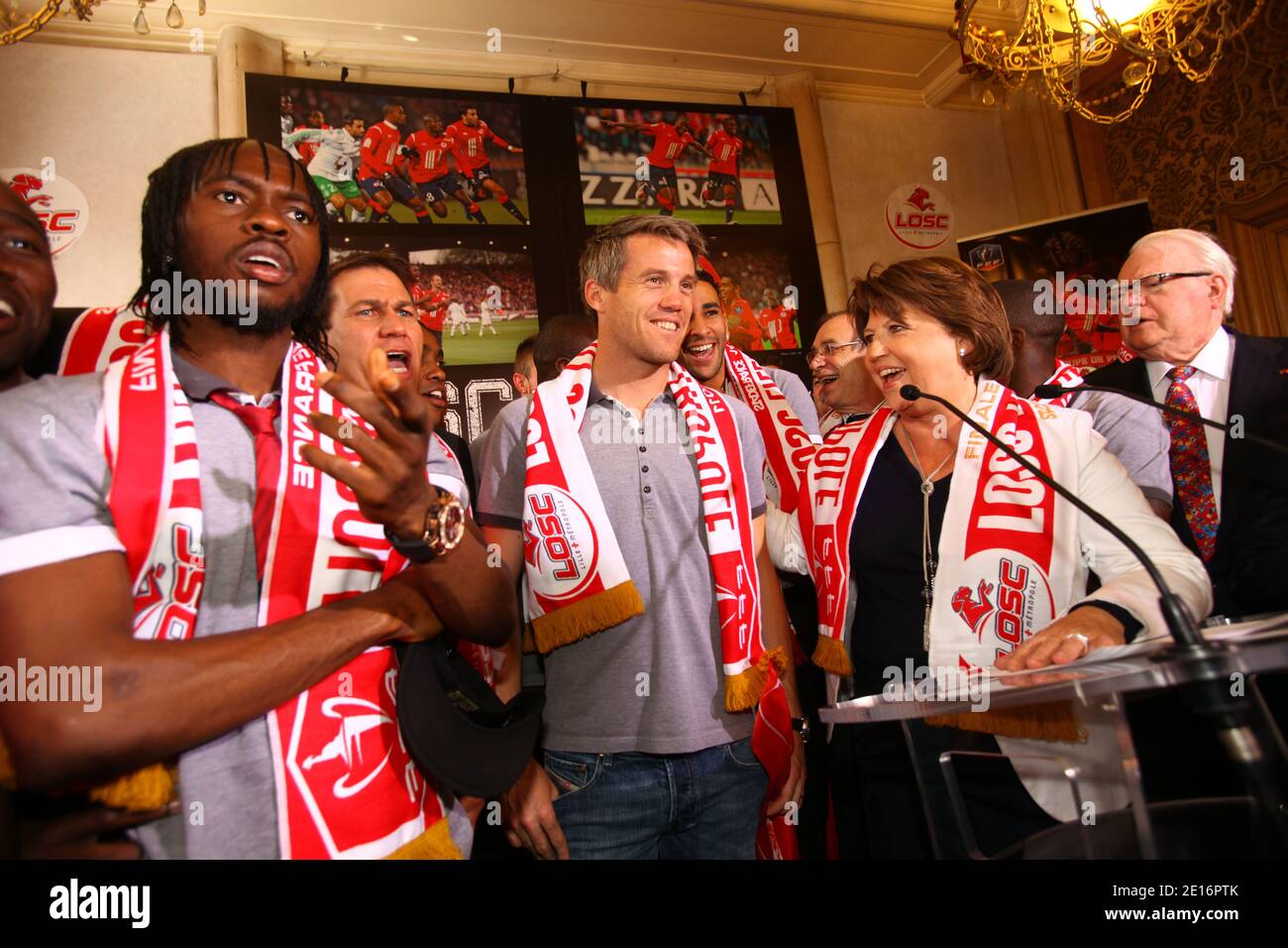 Lille' socialist mayor Martine Aubry waves fans' scarves and sing as ...