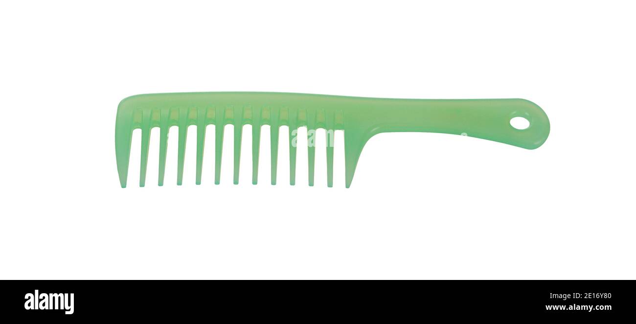 Green plastic hair comb isolated on white background Stock Photo - Alamy