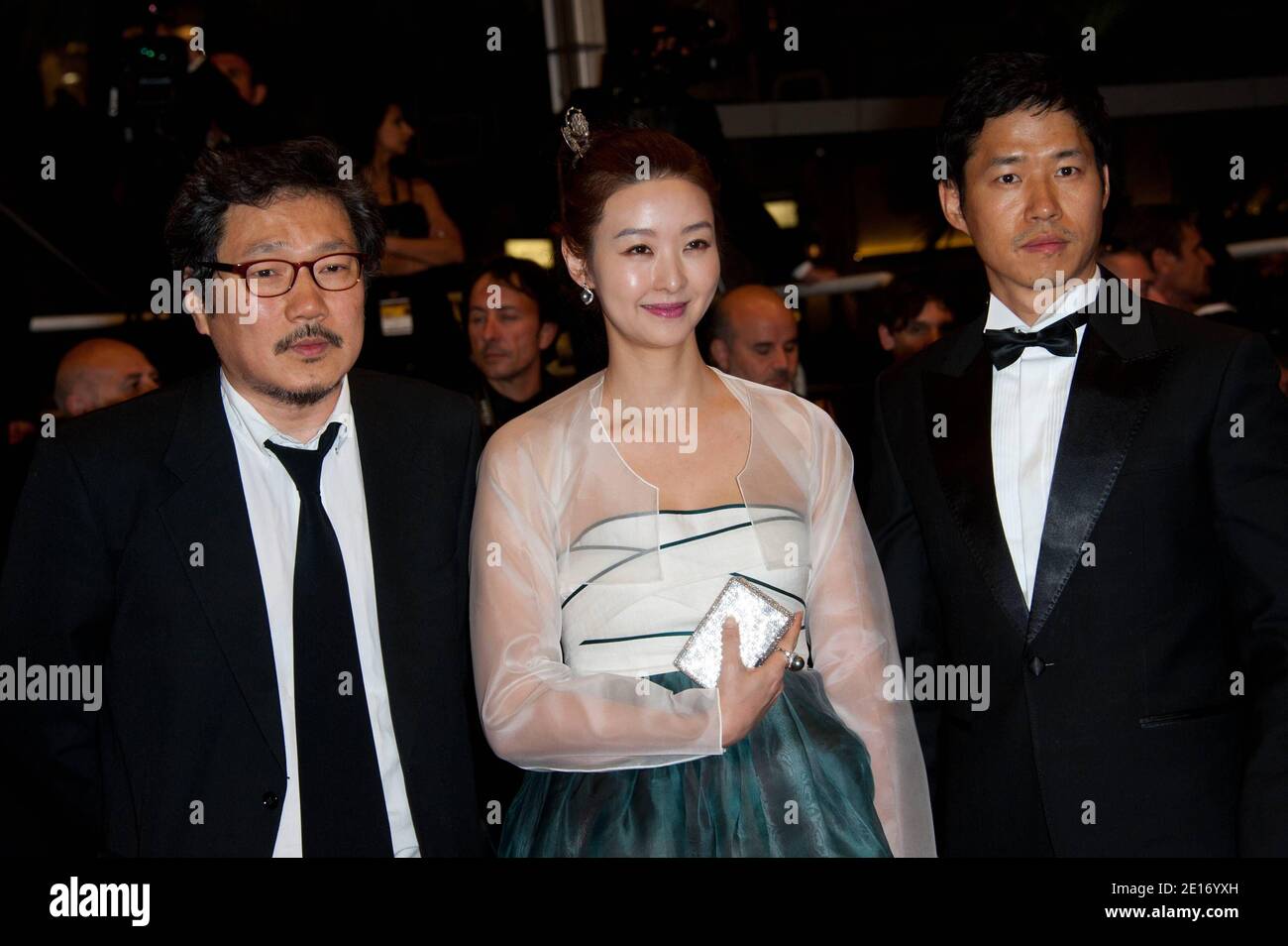 The cast of 'The Day He Arrives', (L-R) director Hong Sangsoo, Song ...