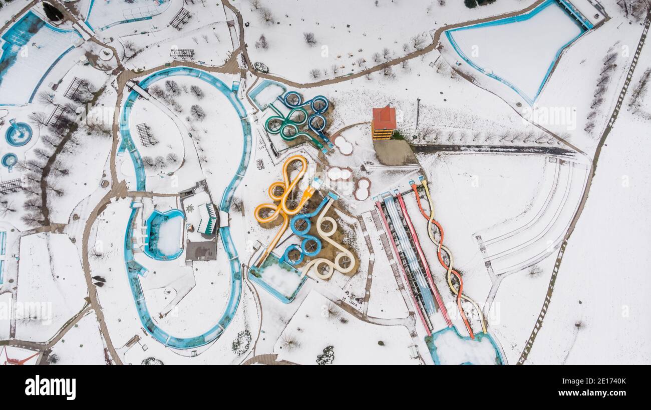 Closed empty water park at winter Stock Photo - Alamy