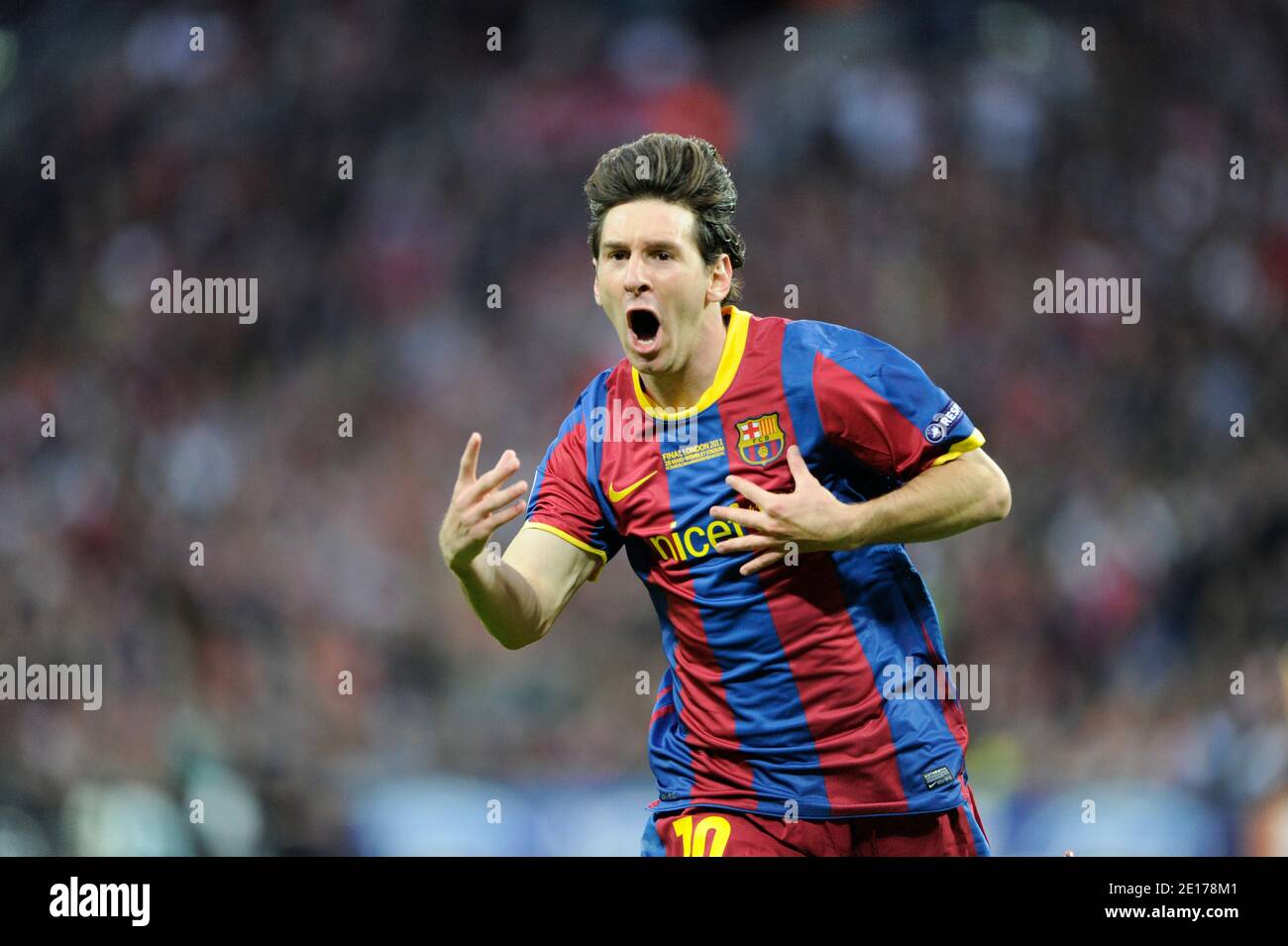 Barcelonas lionel messi scoring goal champions hi-res stock photography ...
