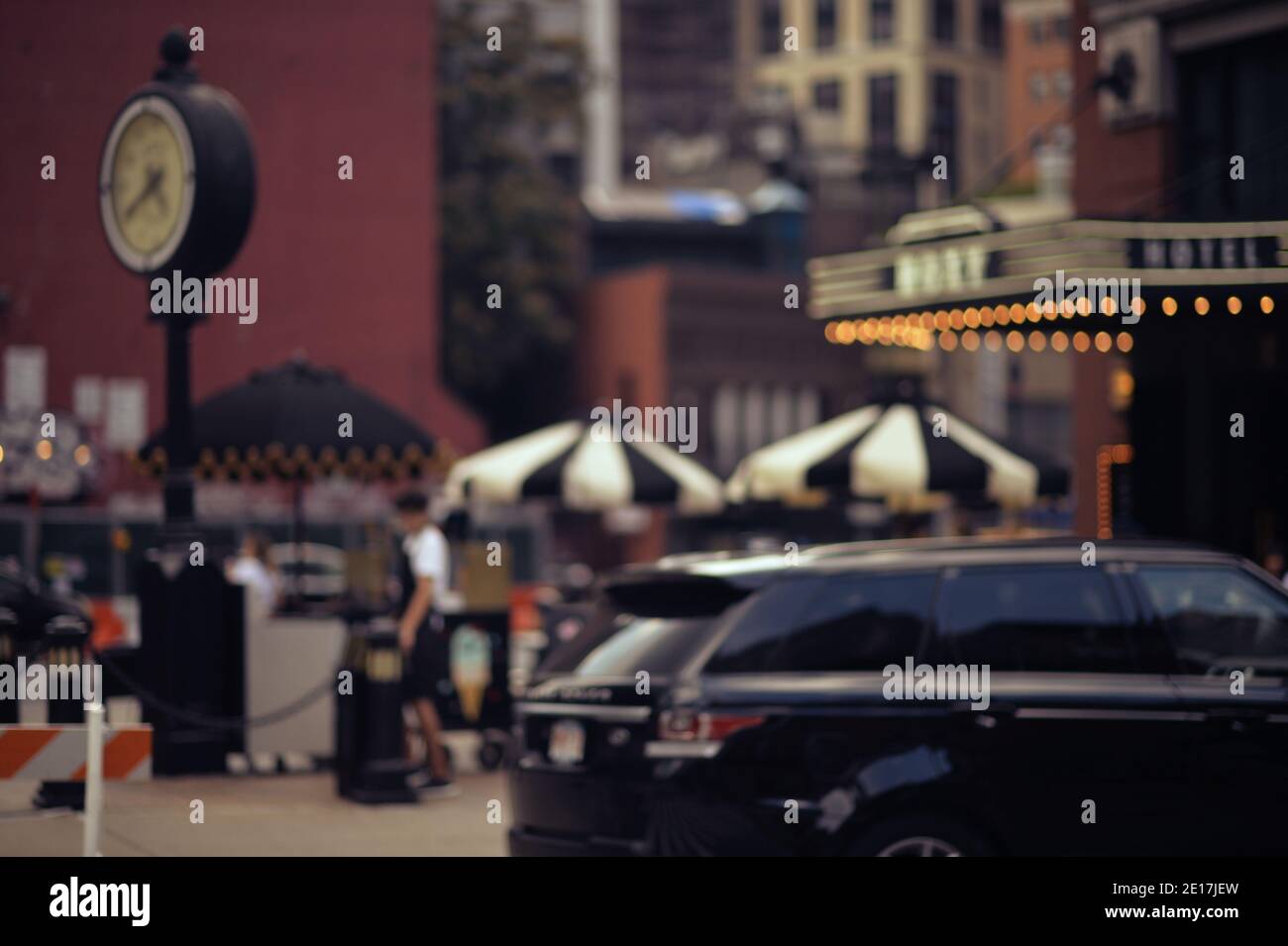 City street with car and outdoor cafe Stock Photo - Alamy