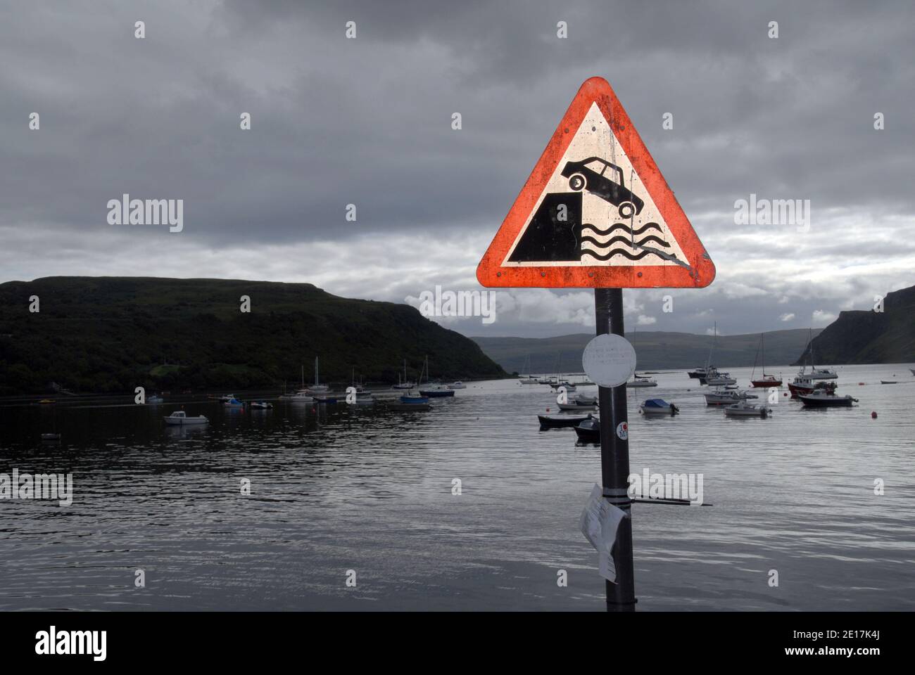 Beware Car falling into sea Sign Stock Photo - Alamy