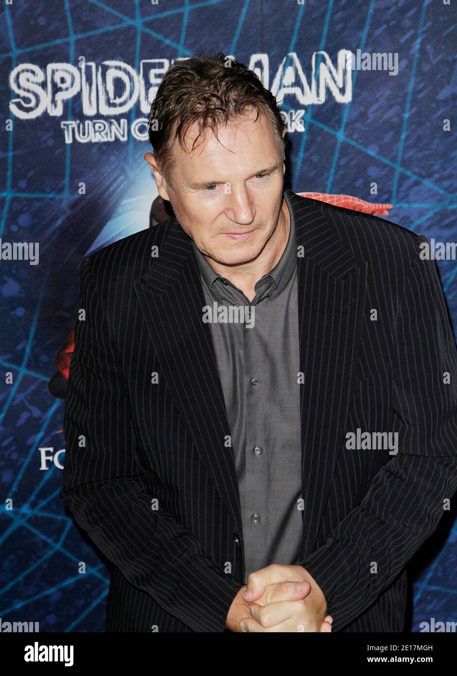 Liam Neeson on the red carpet at the opening of 'Spider-Man: Turn Off ...