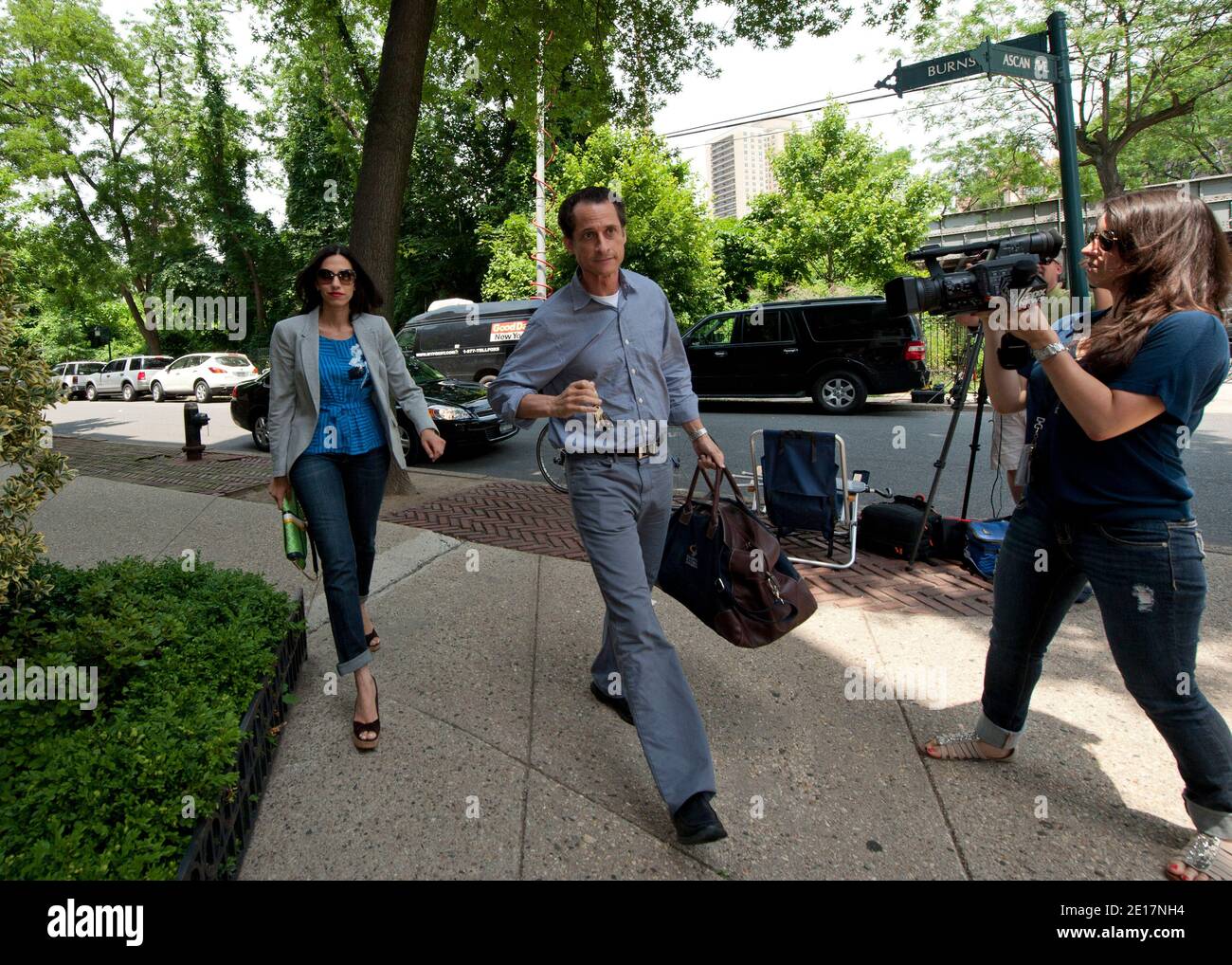 Congressman Anthony Weiner with his wife Huma, retunring to their ...