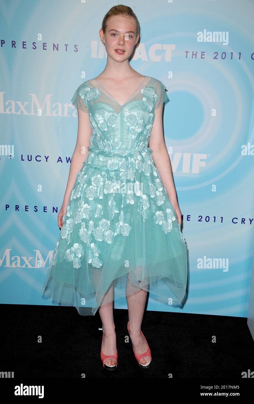 Elle Fanning attends the 2011 Women in Film Crystal + Lucy Awards at ...