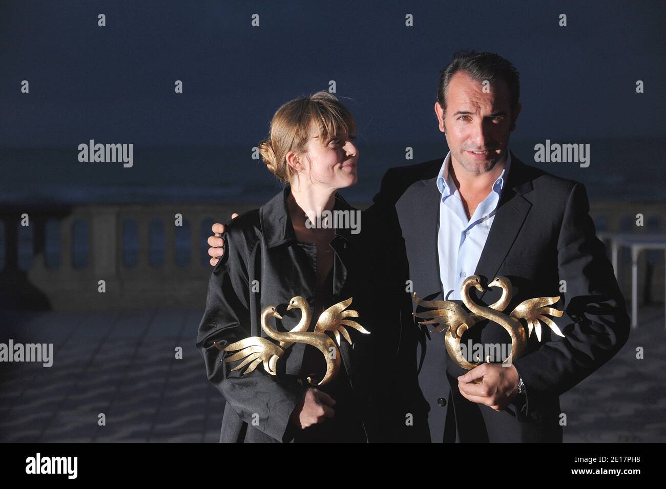 Isabelle Carre and Jean Dujardin pose with the Golden Swan of Best ...