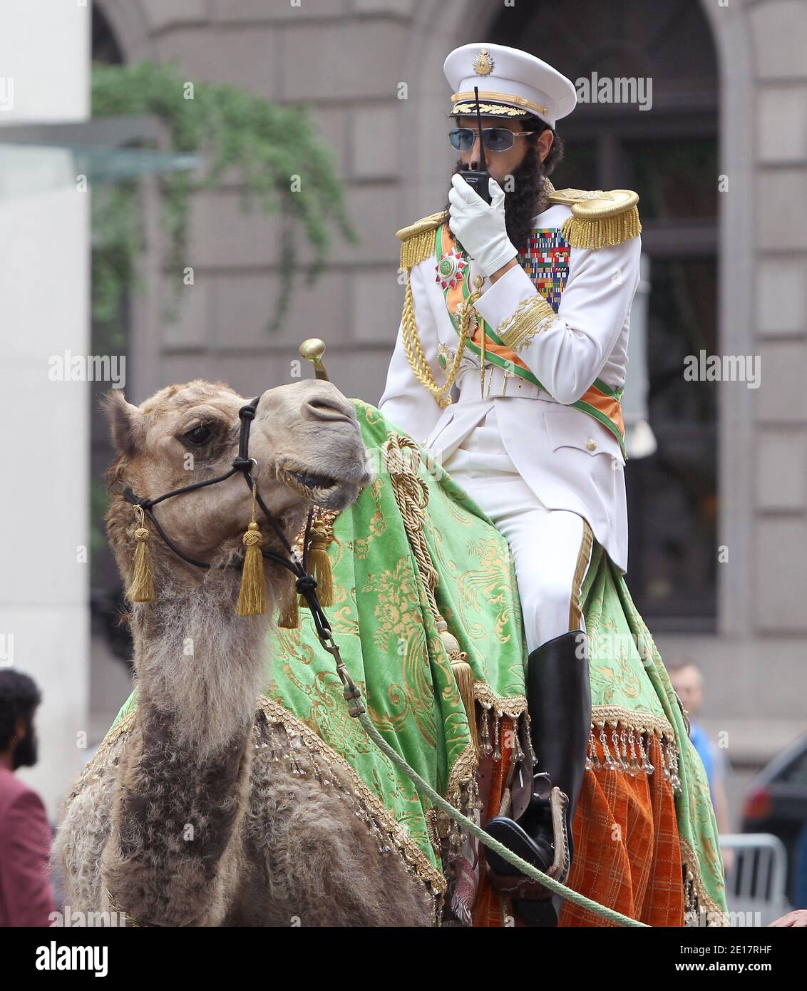Actor Sacha Baron Cohen riding a camel on the Fifth Avenue while ...