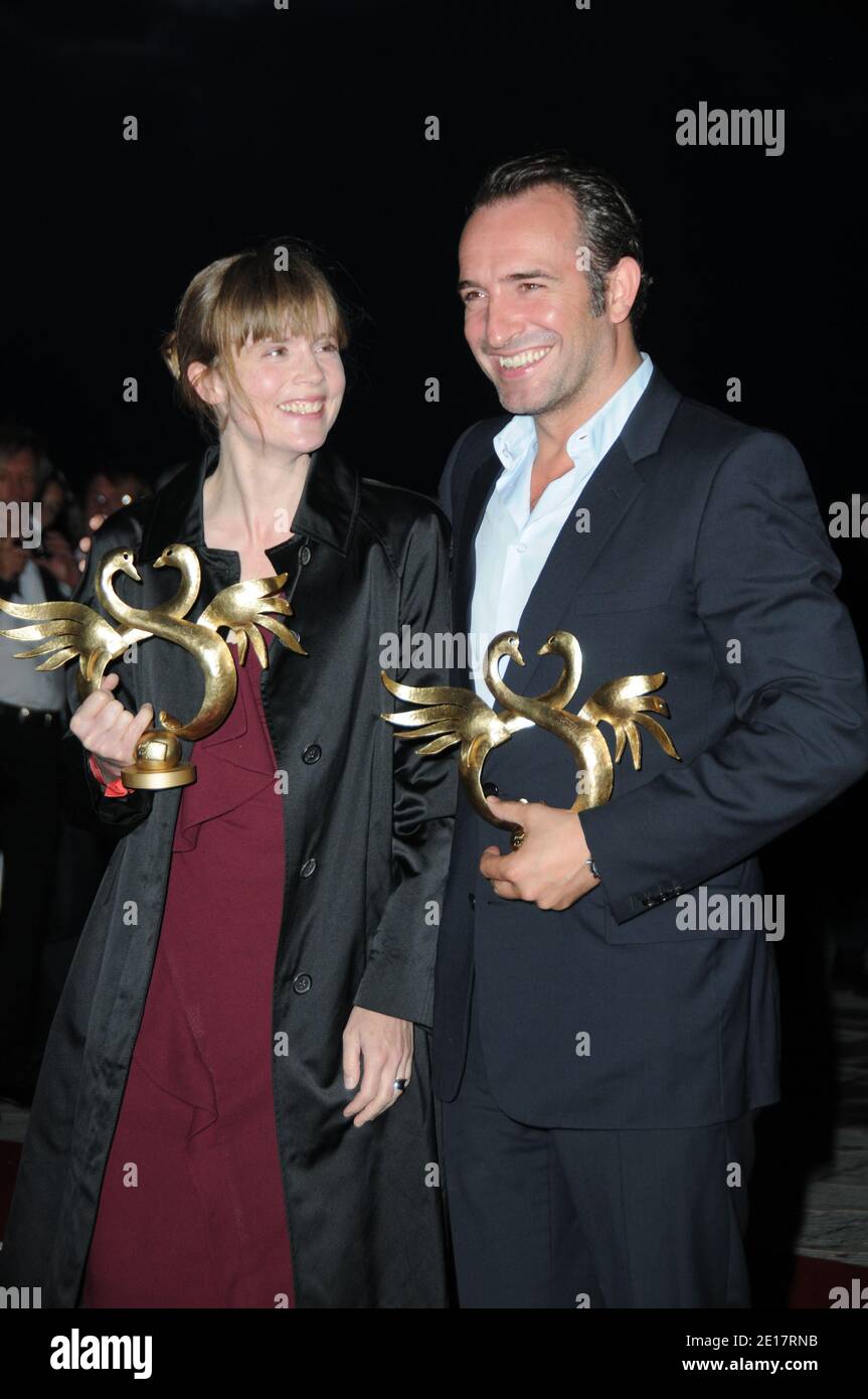 Isabelle Carre and Jean Dujardin pose with their Golden Swan of Best ...