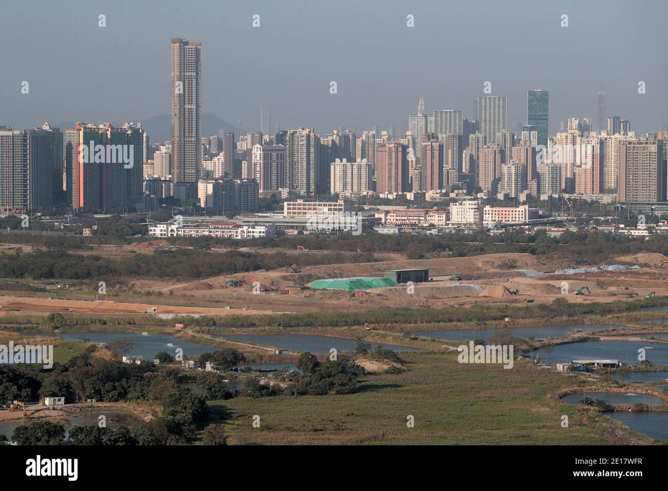 "Lok Ma Chau Loop” in middle ground, with the Fishponds of Ma Tso Lung ...