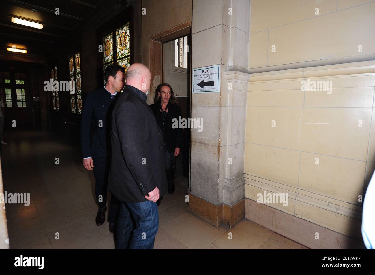 British fashion designer John Galliano and friend Alexis Roche arrive ...