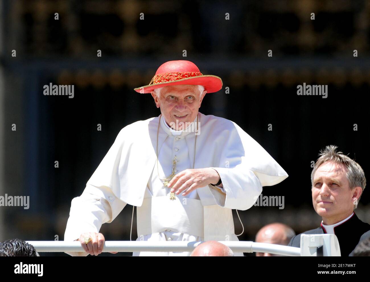 Sunny day in Rome: Pope Benedict XVI wears his red Saturn hat, named ...
