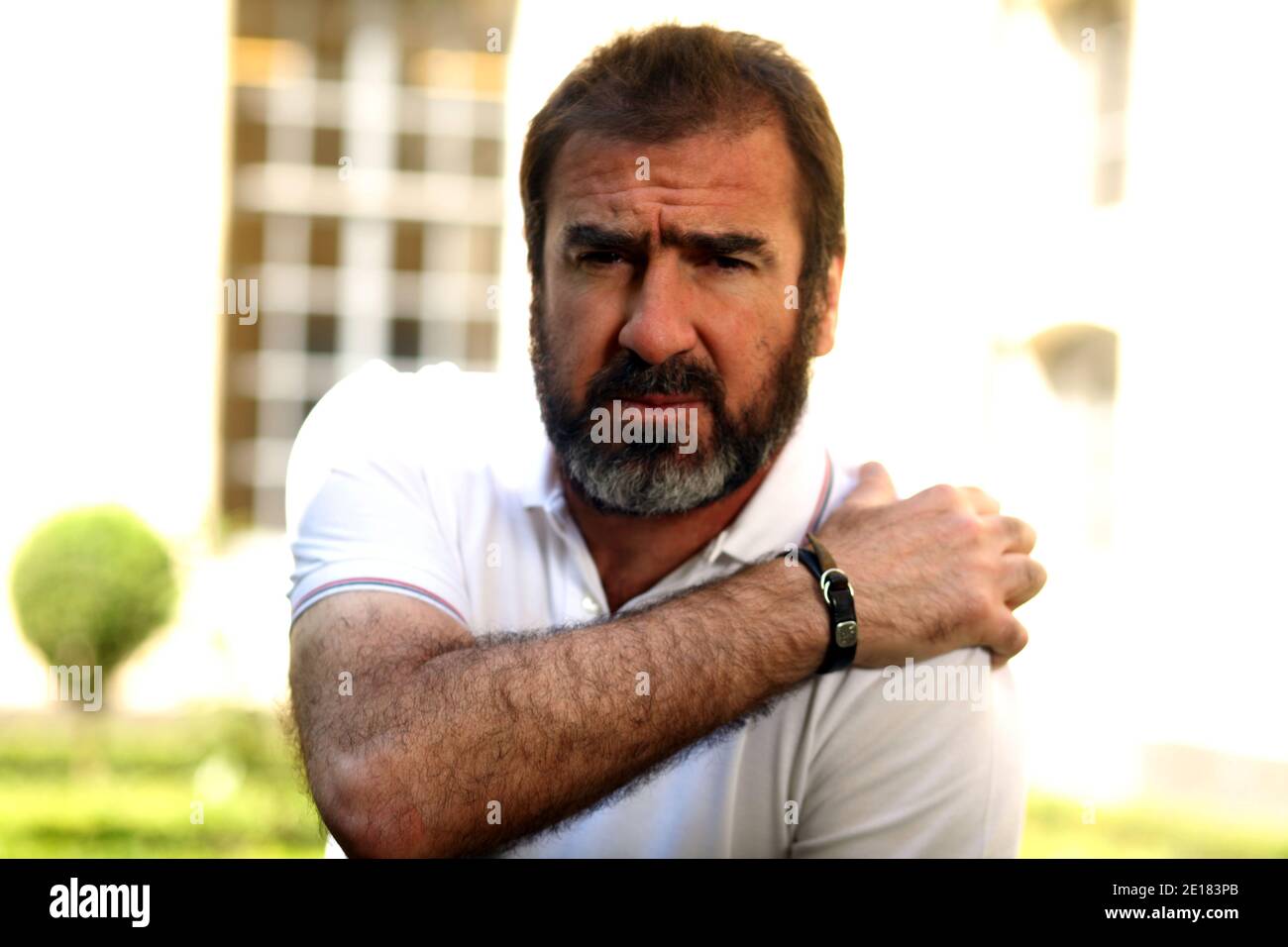 French actor Eric Cantona poses ahead of the screening of his latest ...