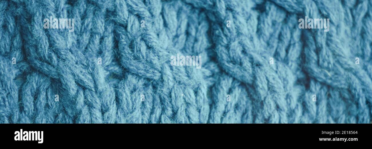 Knitted pattern of threads in pale blue color Stock Photo - Alamy