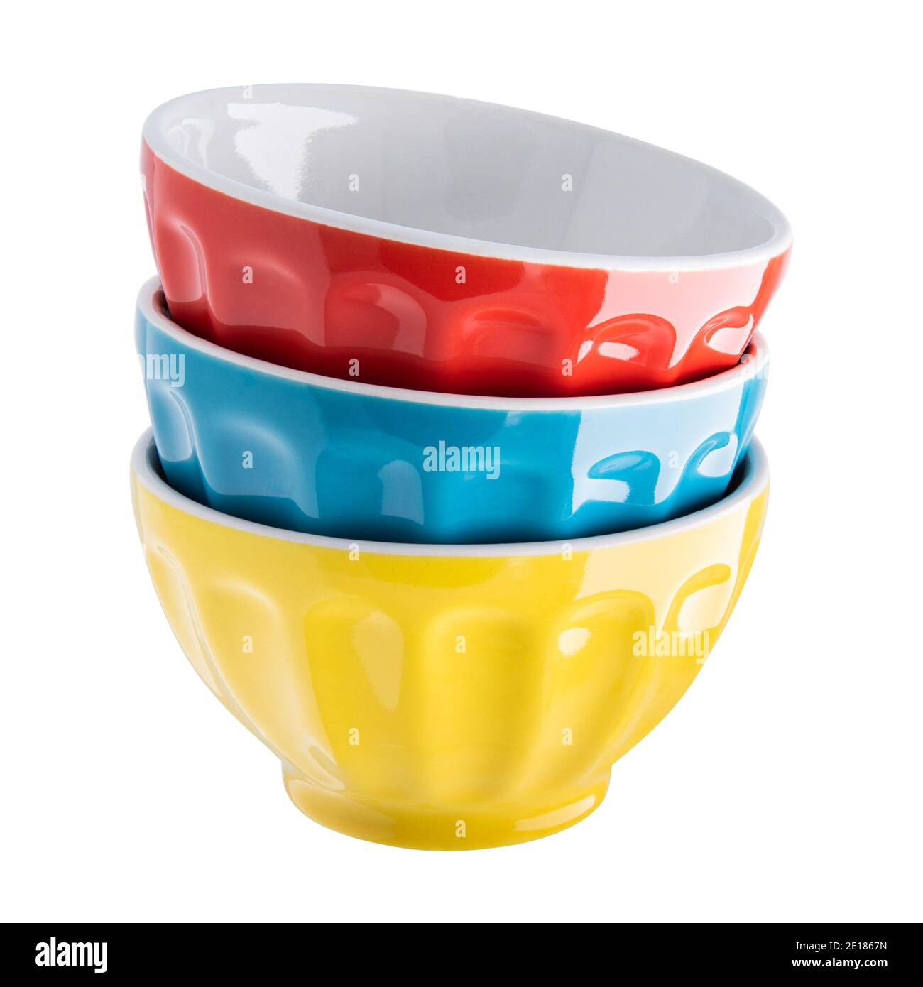Stack of colorful tea cups isolated on white background. Full depth of ...