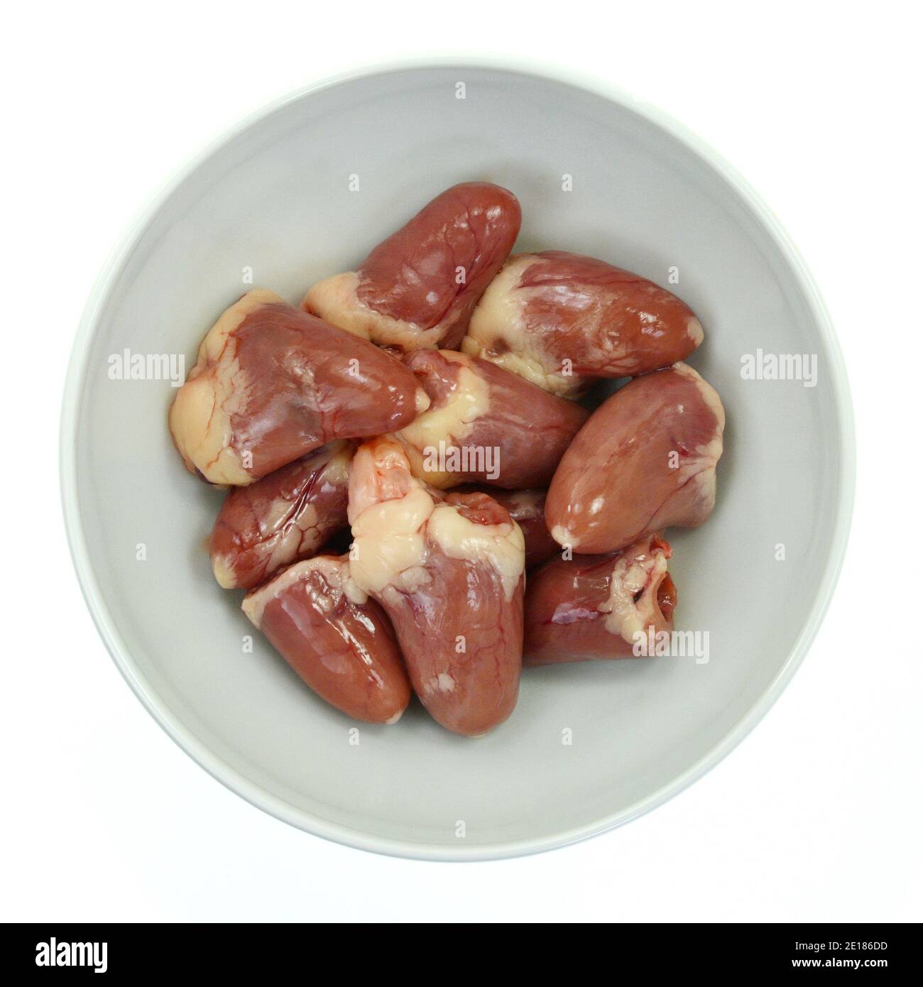 Raw chicken heart isolated on white background Stock Photo - Alamy