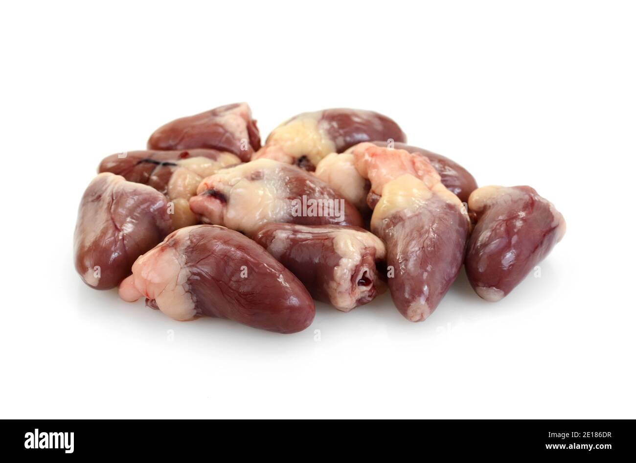 Raw chicken heart isolated on white background Stock Photo - Alamy
