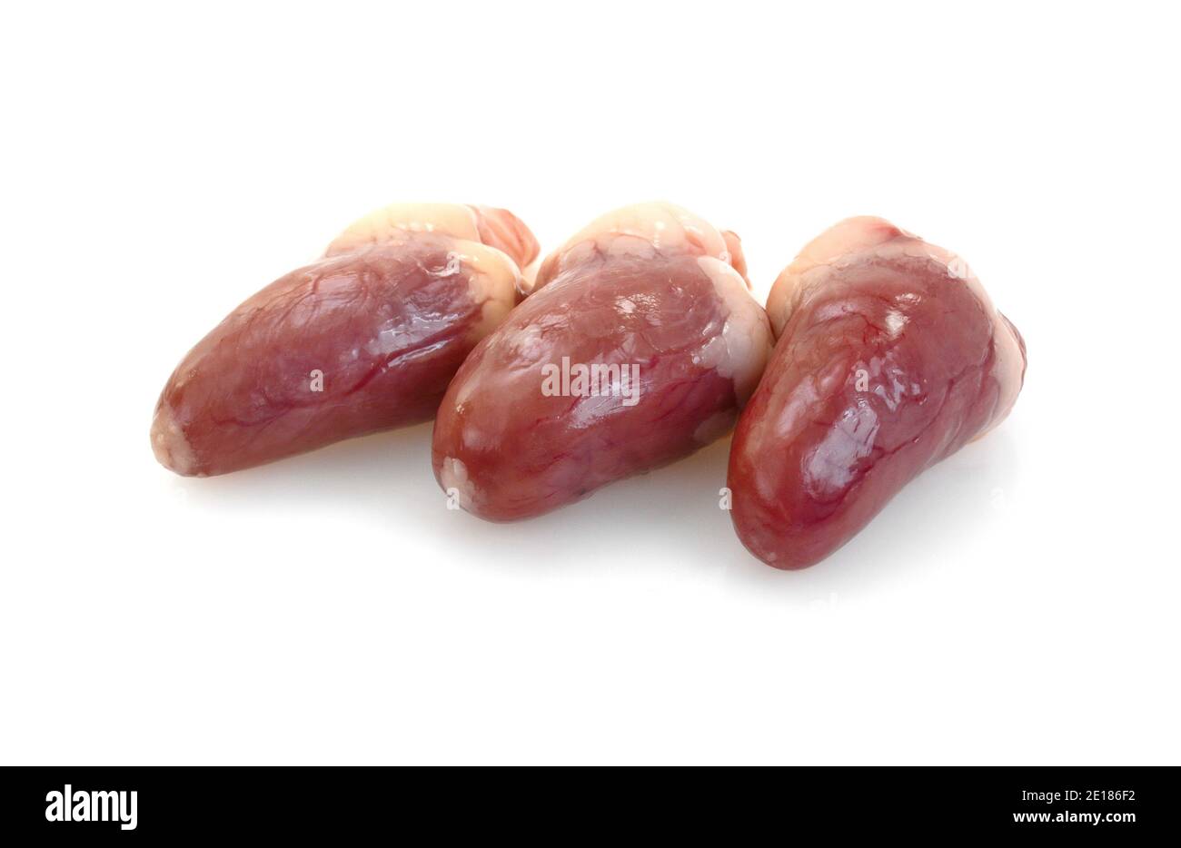 Raw chicken heart isolated on white background Stock Photo - Alamy