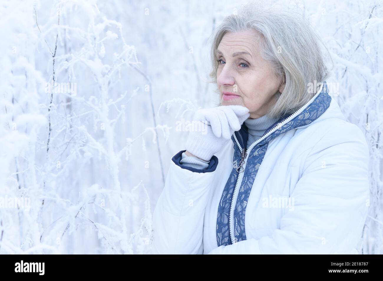 Sad woman posing in winter hi-res stock photography and images - Alamy