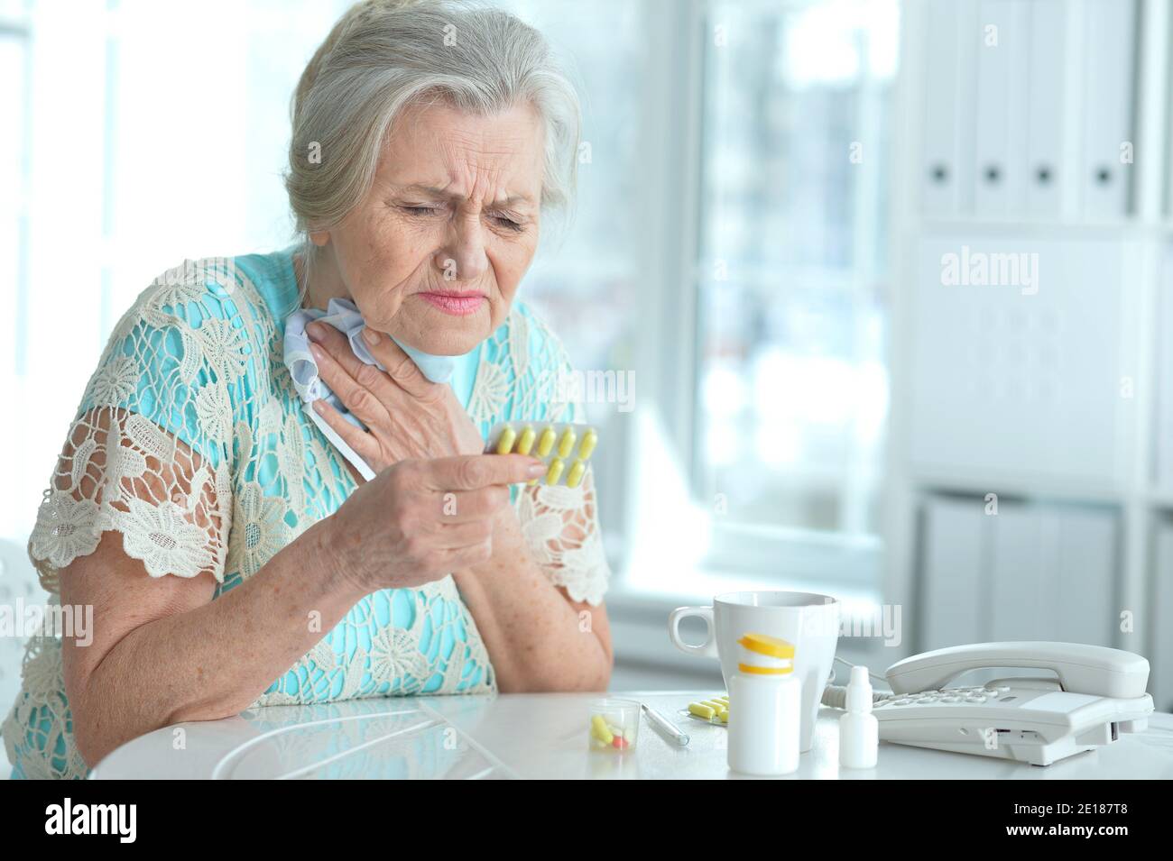 Sad sick senior woman hi-res stock photography and images - Alamy