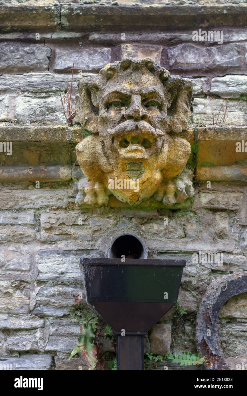 Stone gargoyle for spitting rain water from the roof of the building ...