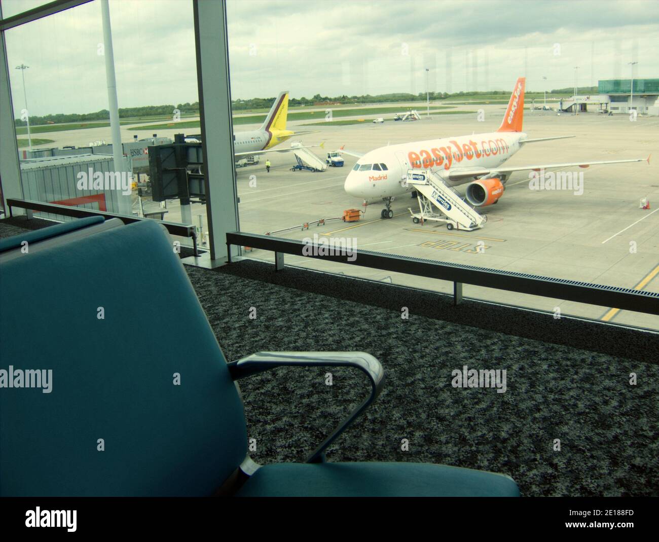 Easy jet airplane on the runway at an airport Stock Photo - Alamy