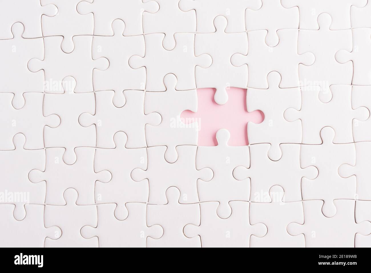 Top view flat lay of paper plain white jigsaw puzzle game texture ...