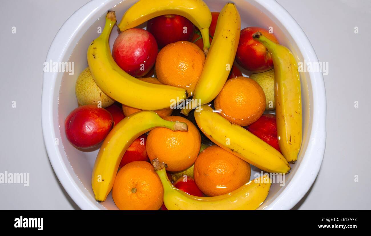 Washing fresh fruits hi-res stock photography and images - Alamy