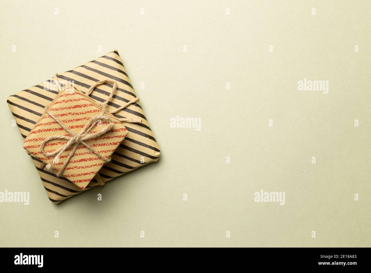 Stripe pattern gift boxes on khaki background. flat lay, top view, copy ...