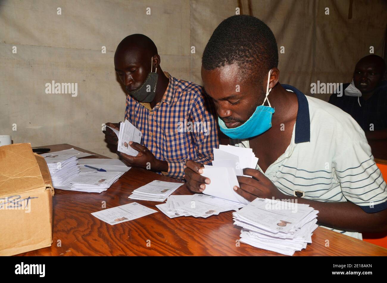 Kampala, Uganda. 4th Jan, 2021. Electoral Commission officials arrange ...