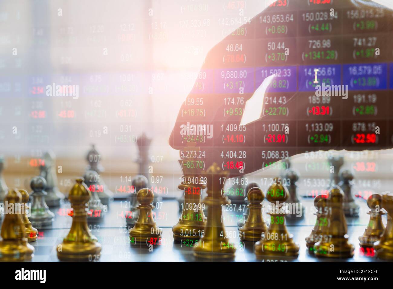Chess game on chess board behind business man background. Business ...