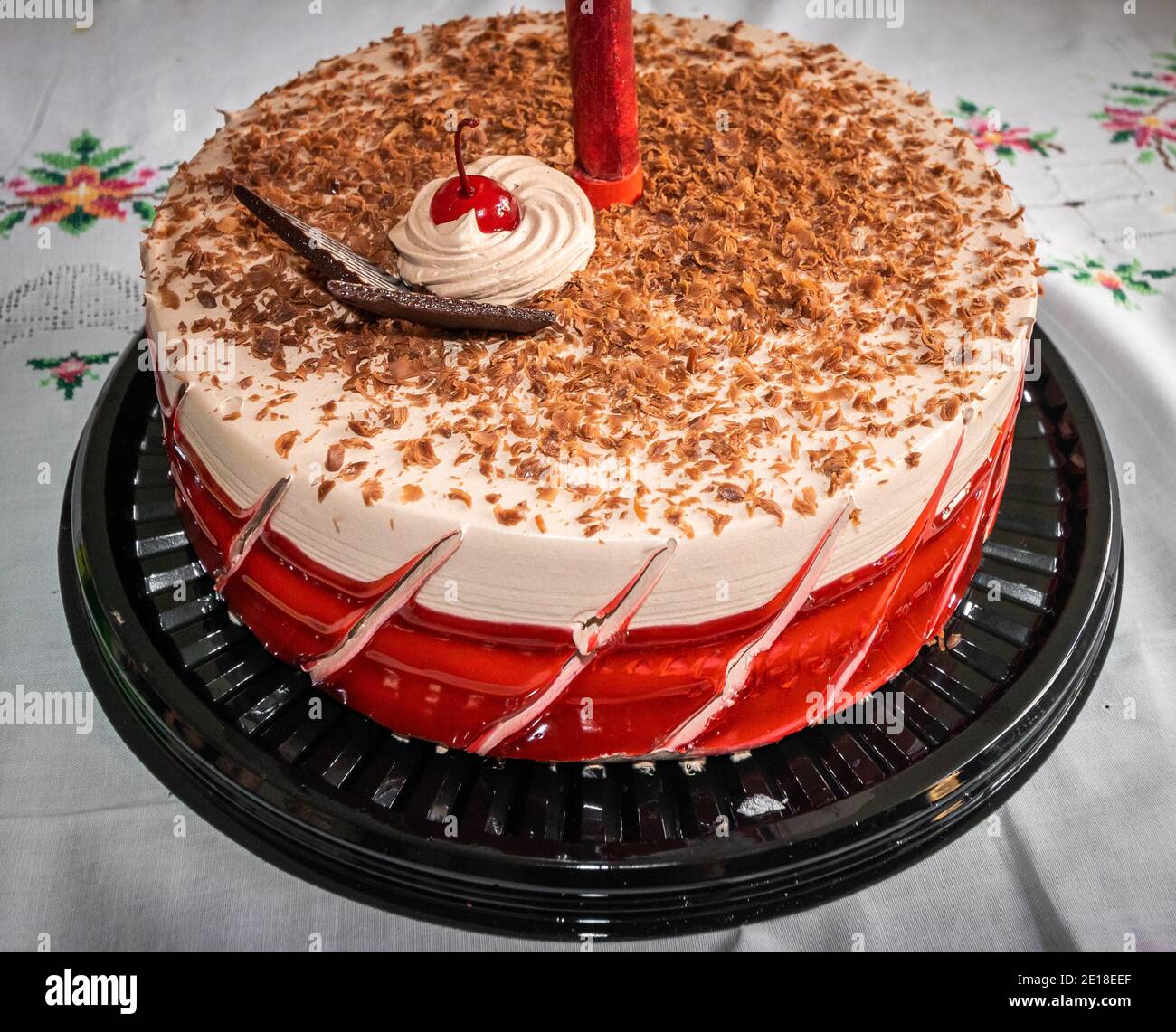 A delicious cake being sliced to share and celebrate some special ...