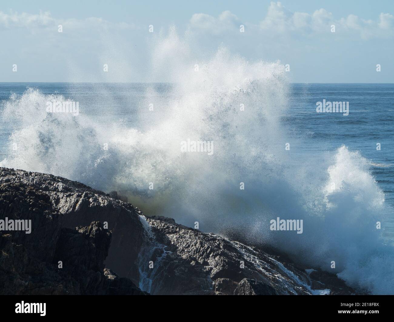 Wave breaking over headland hi-res stock photography and images - Alamy