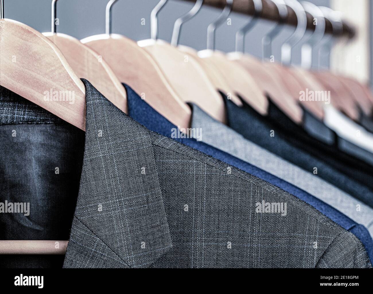 Suit jacket on hanger hi-res stock photography and images - Alamy
