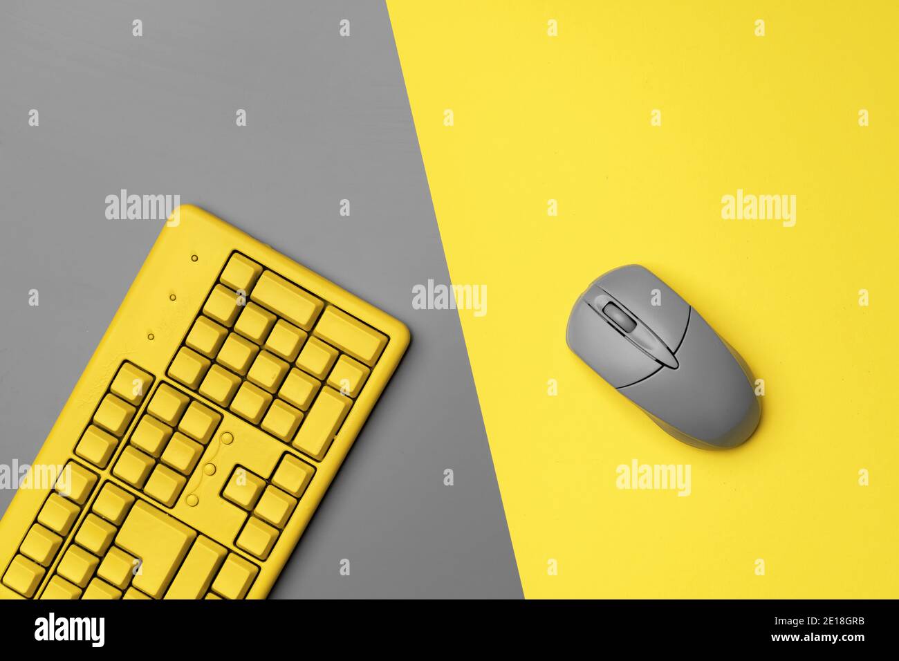 Computer keyboard and mouse in yellow gray colors Stock Photo - Alamy