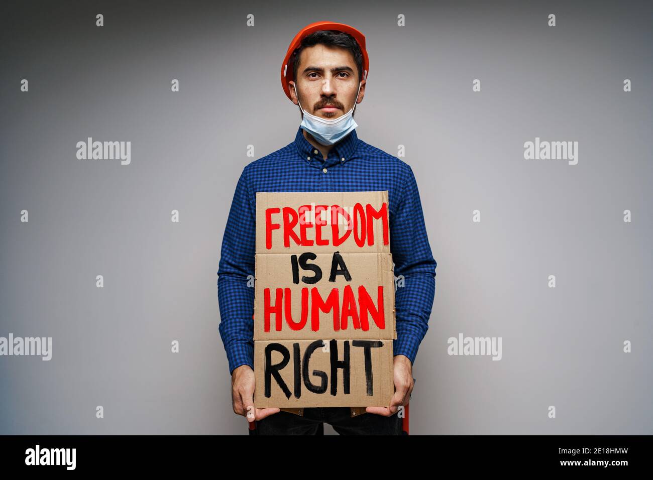 'Freedom is a human right' placard in hands of protester man Stock ...