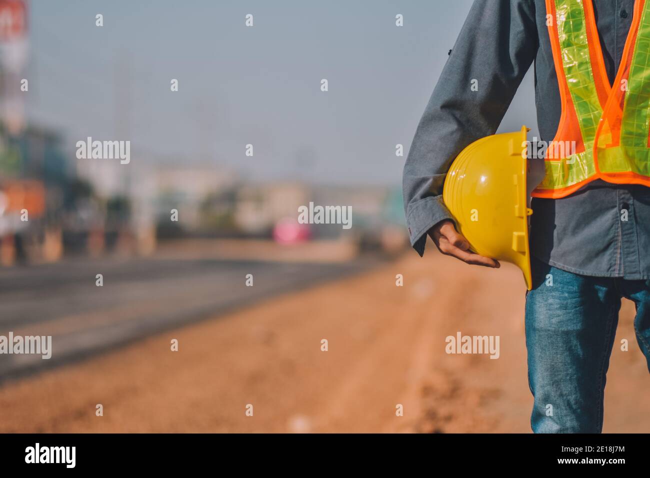 Close up Engineering holding Yellow helmet hard hat safety and Road ...