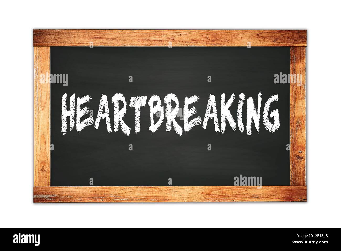 HEARTBREAKING text written on black wooden frame school blackboard ...