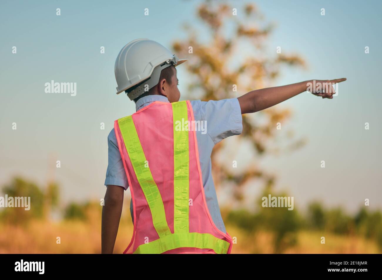 Boy kid Engineer standing outdoor holding hand success concept Stock ...