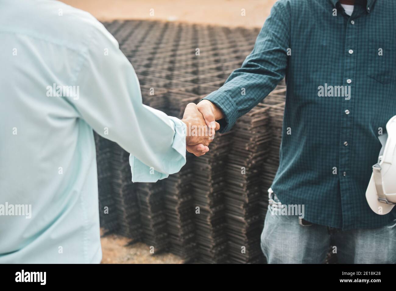 Business people shaking hands agreement success project estate building ...