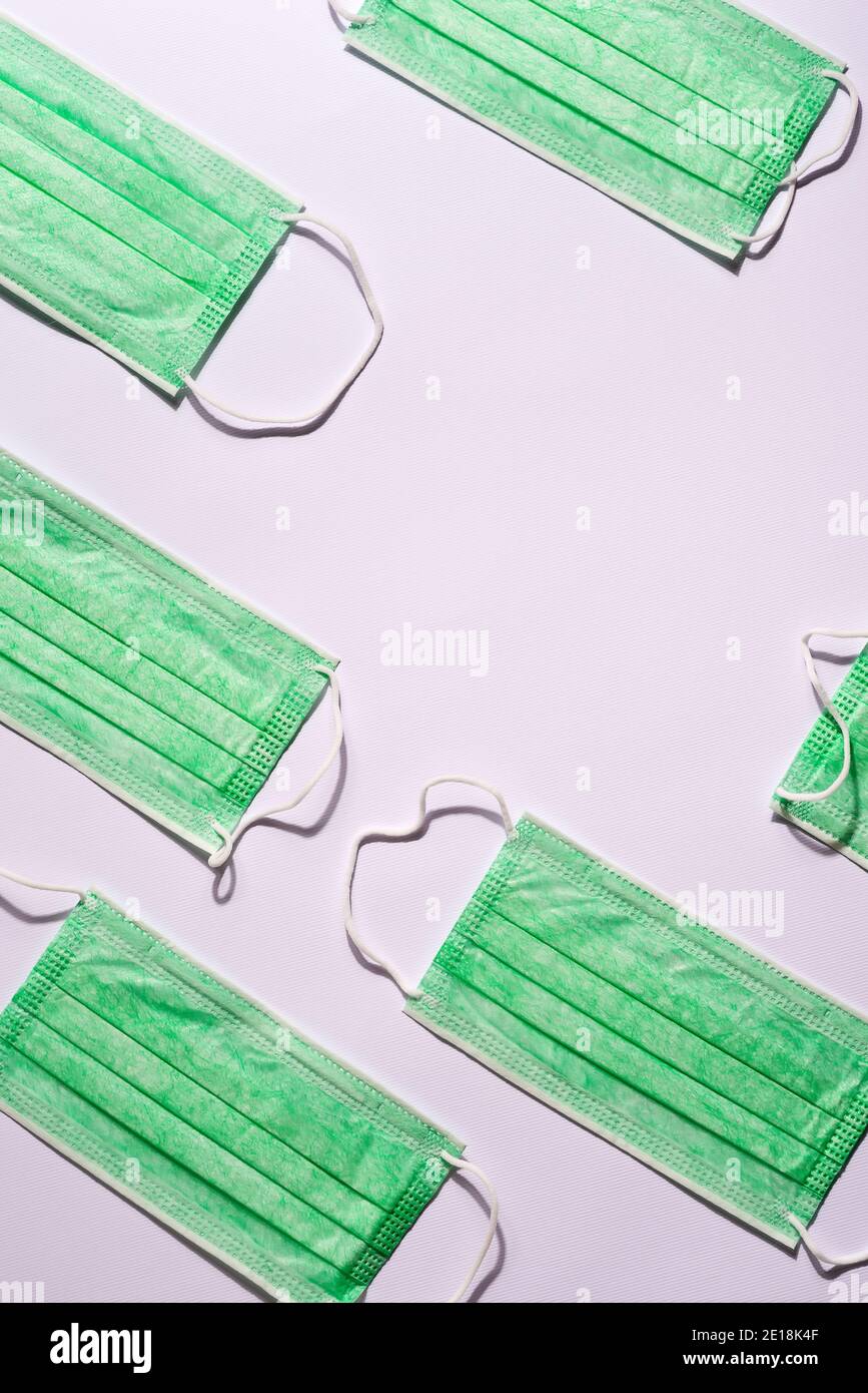 Surgical green mask with rubber ear straps. Procedure mask from ...