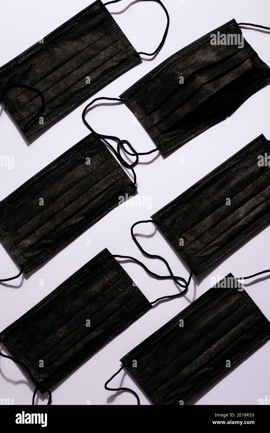 Surgical black mask with rubber ear straps. Procedure mask from ...