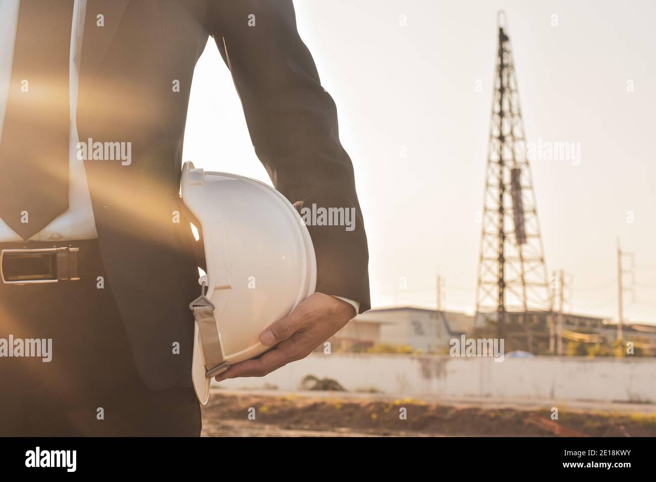 Close up project manager holding helmet hard hat construction building ...
