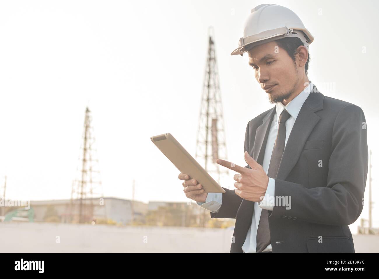 Project manager holding tablet inspection estate construction building ...