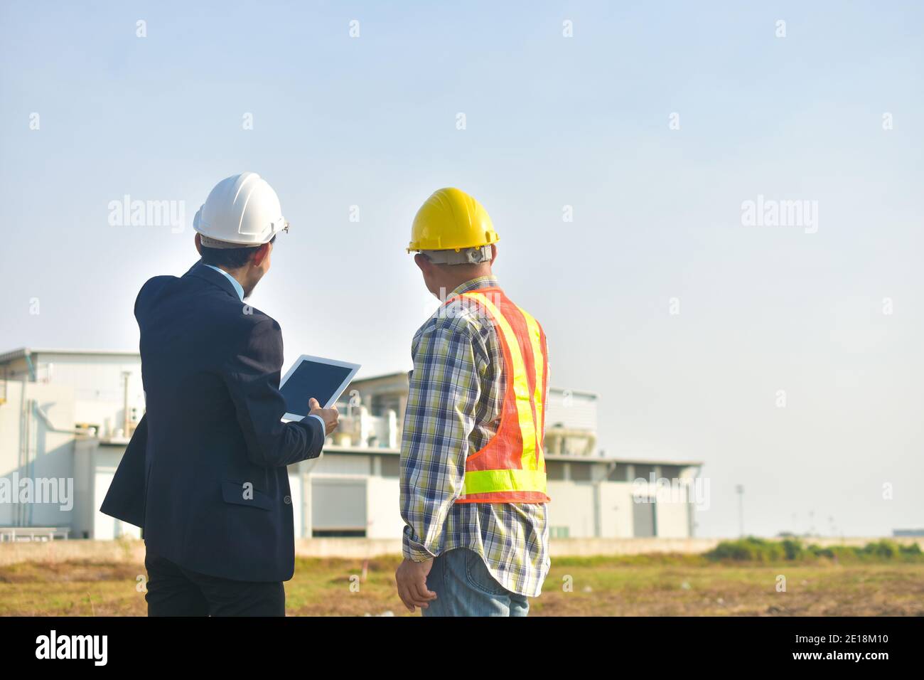 Project manager and Engineer communication use tablet factory ...