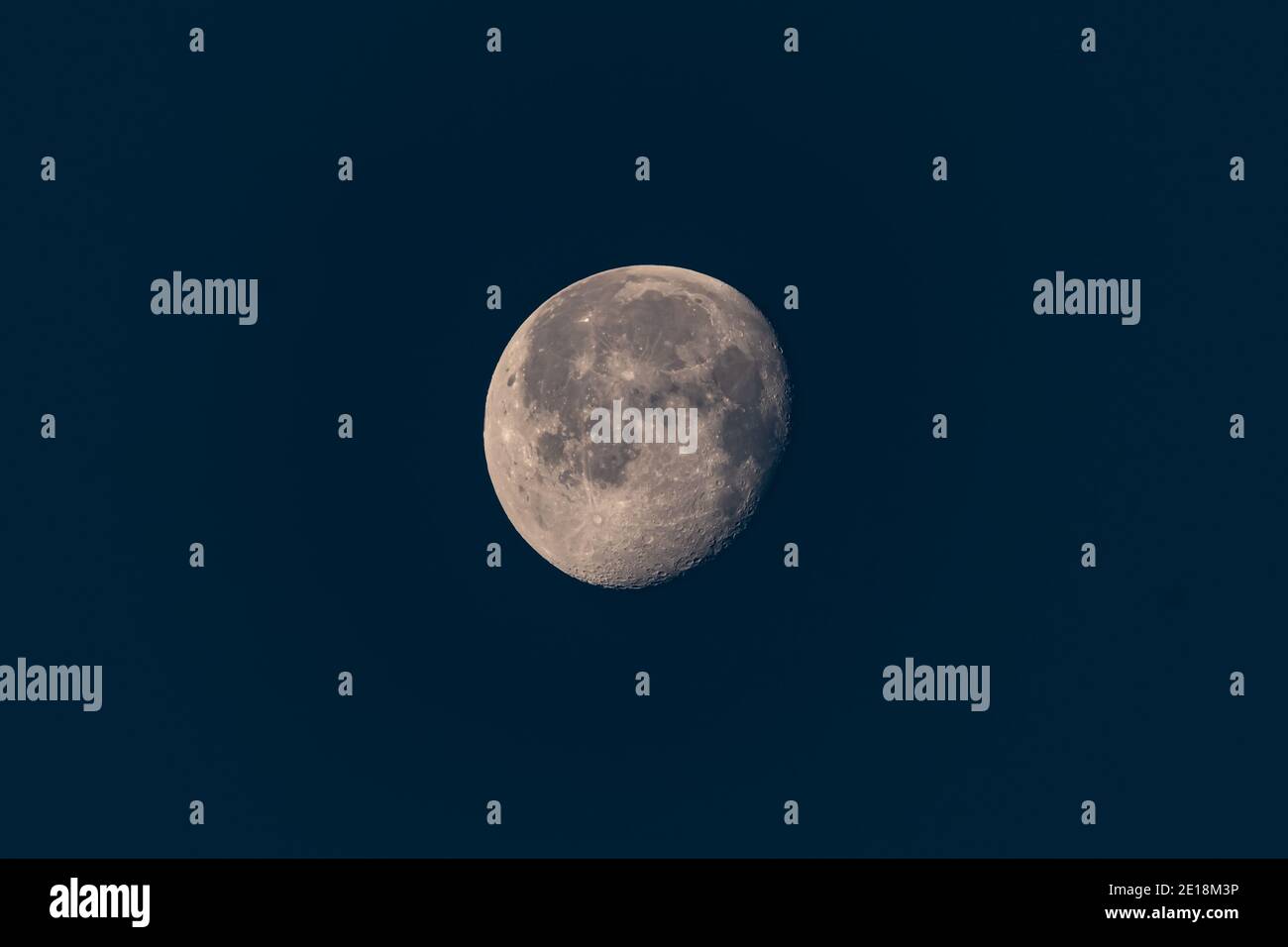 Growing phase moon in dark sky Stock Photo - Alamy