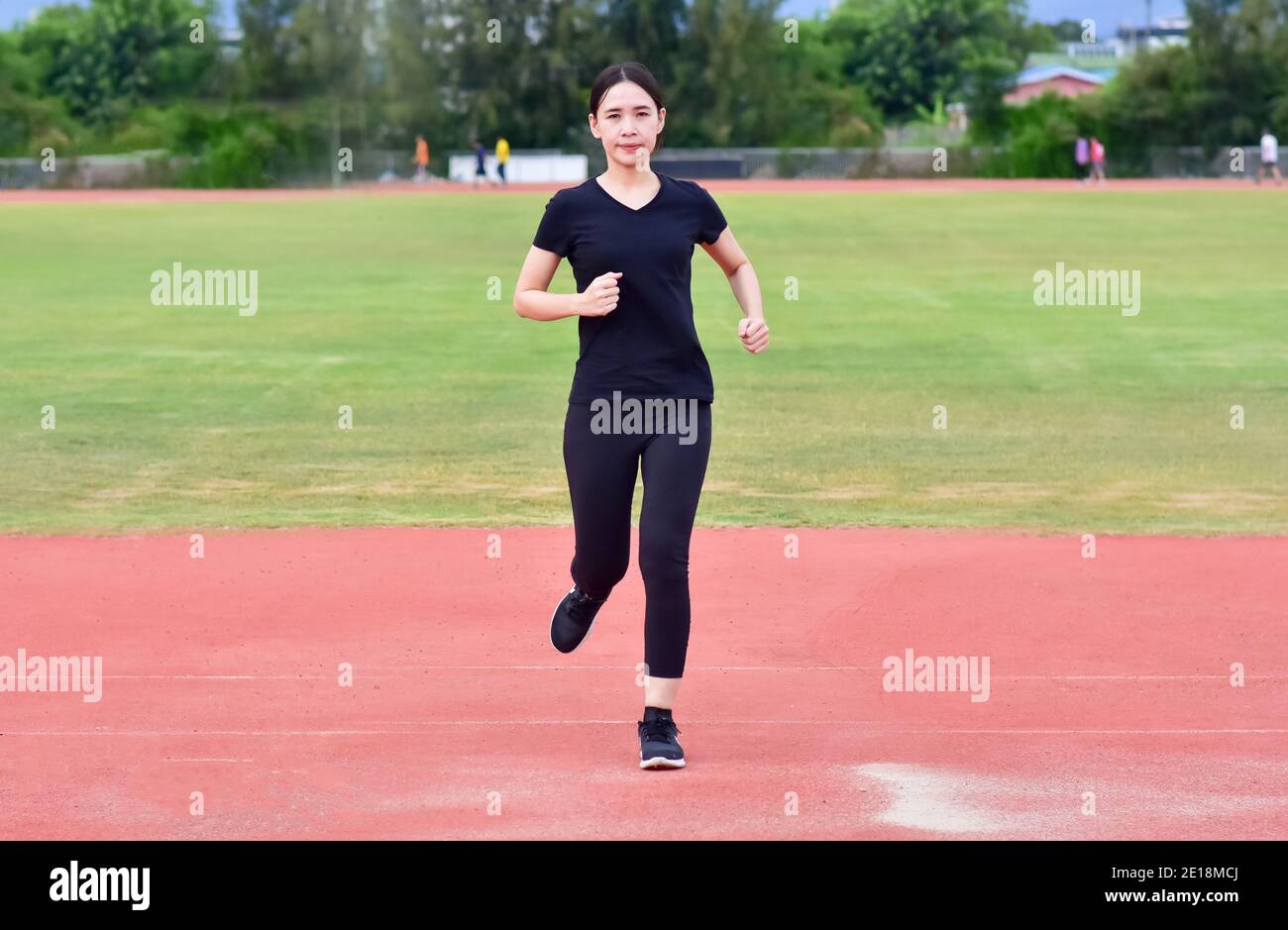 Runner Asian Women running jogging exercise on morning Stock Photo - Alamy