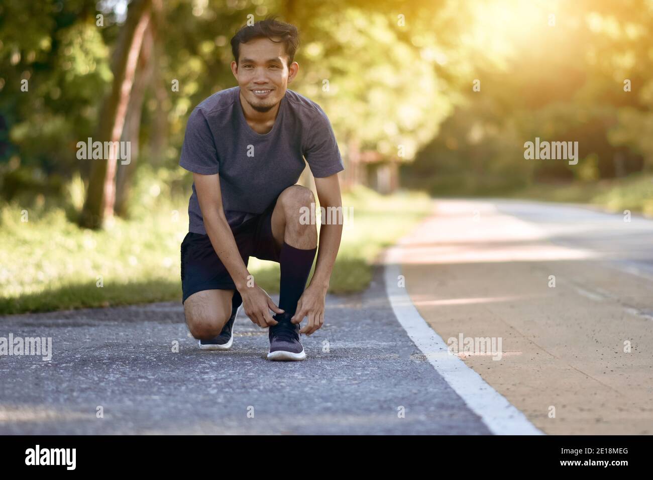 Asian man runner sprinting outdoor hi-res stock photography and images ...